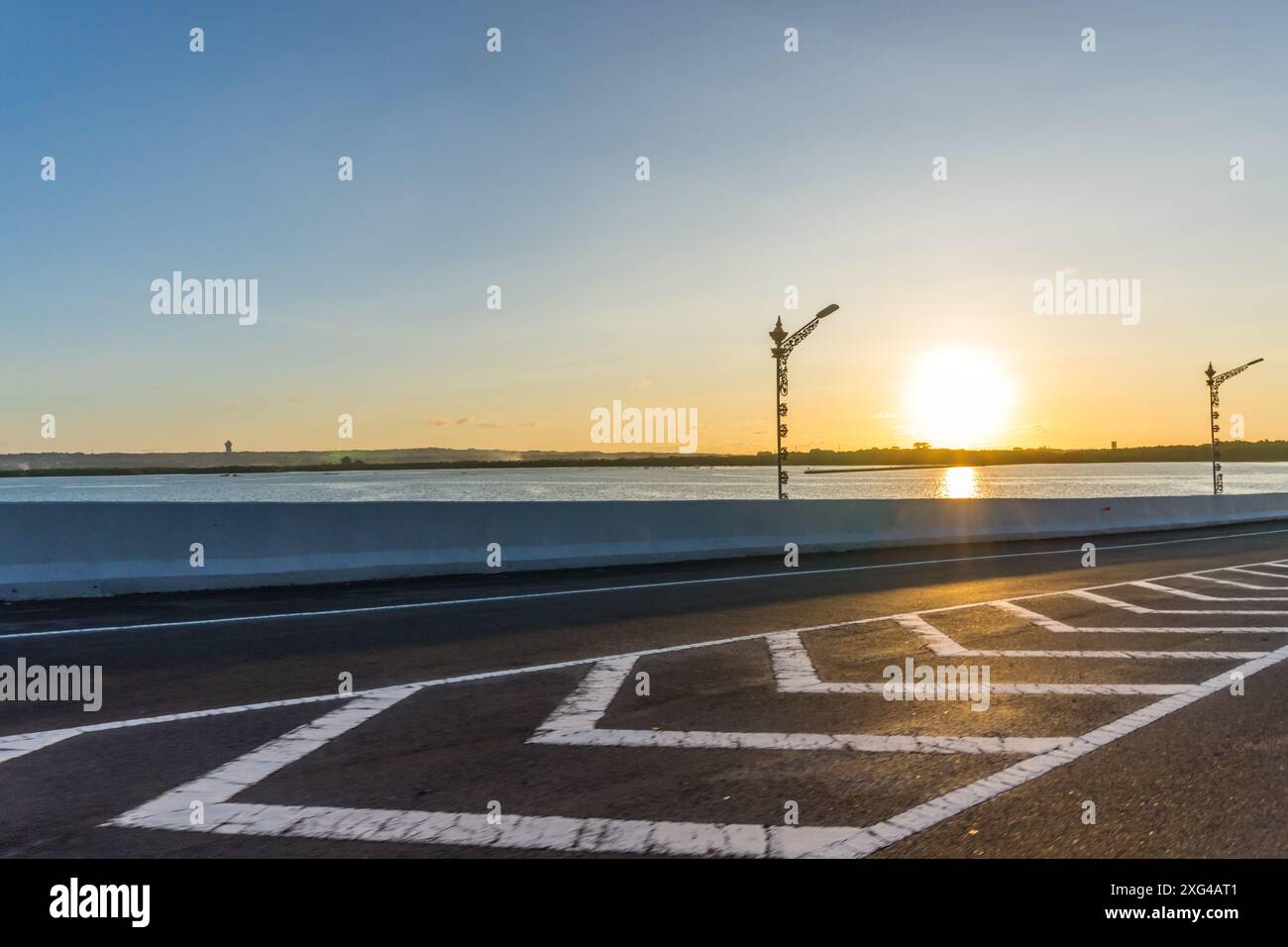 Asphalt road and beach at sunset. Road and beach background Stock Photo ...