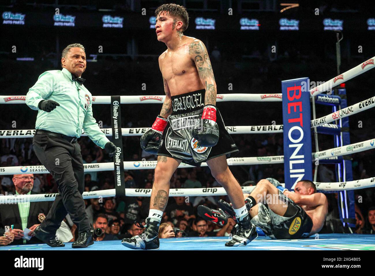 PHOENIX, ARIZONA - JUNE 29: Jesse "Bam" Rodríguez knocks down Juan ...