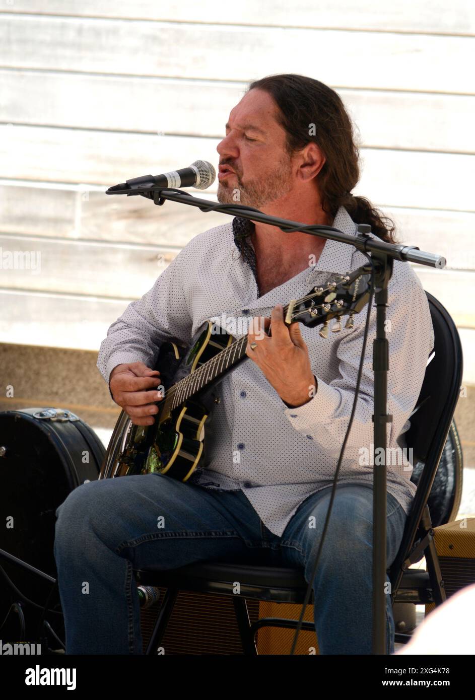 Blues musician and singer Max Hightower perfoms at a music festival in ...
