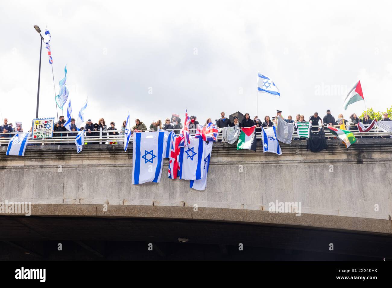 London, UK. 06 JUL, 2024. Pro Israel protestors on Waterloo Bridge hold ...