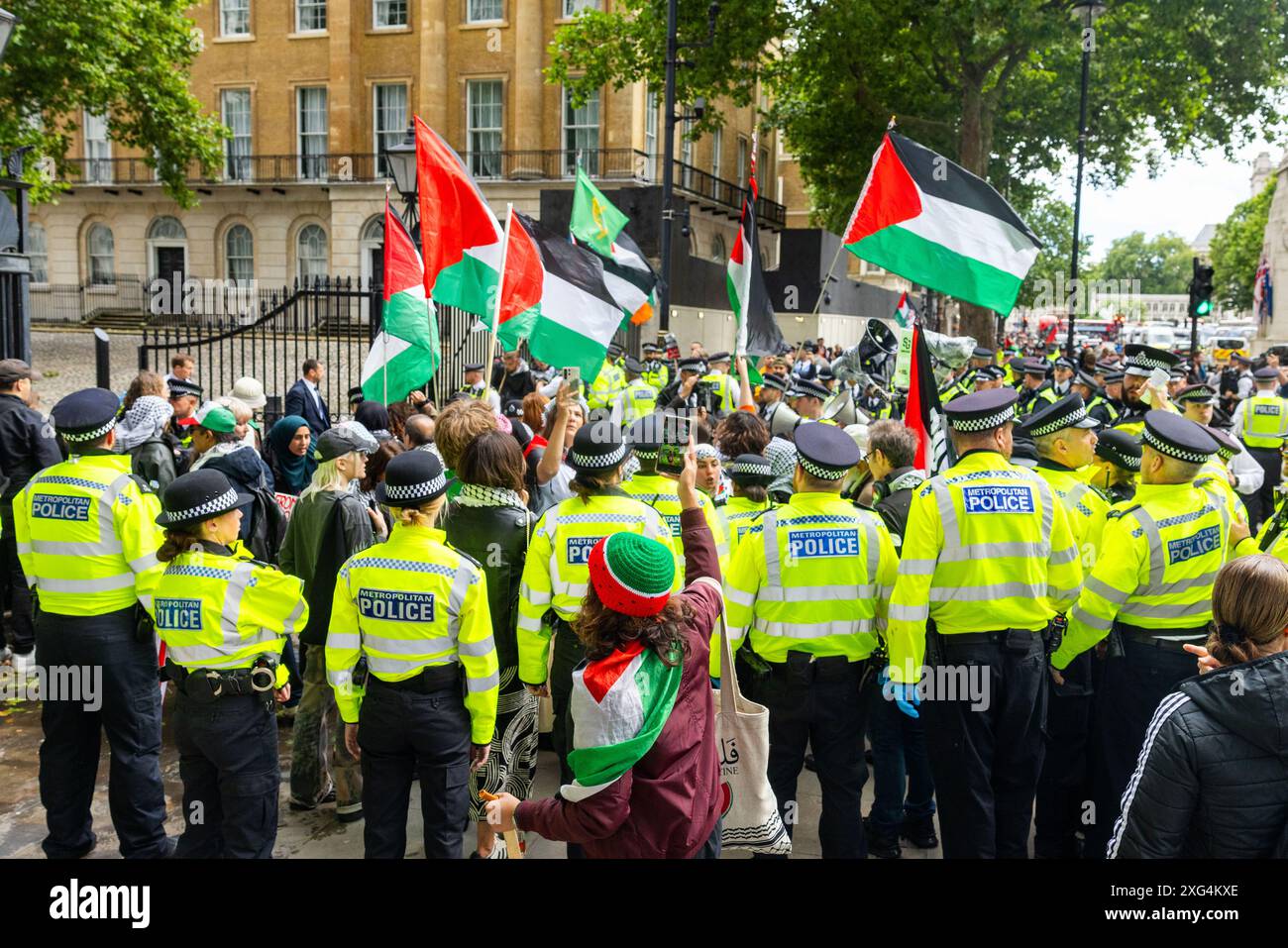 London, UK. 06 JUL, 2024. Police move protestors as group of people ...