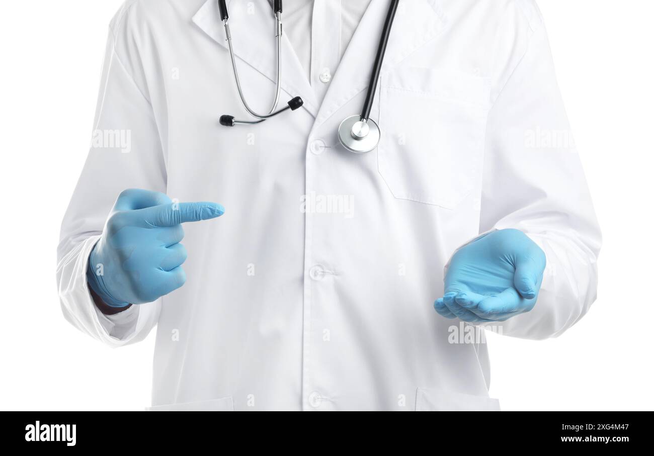 Doctor pointing at something on white background, closeup Stock Photo ...
