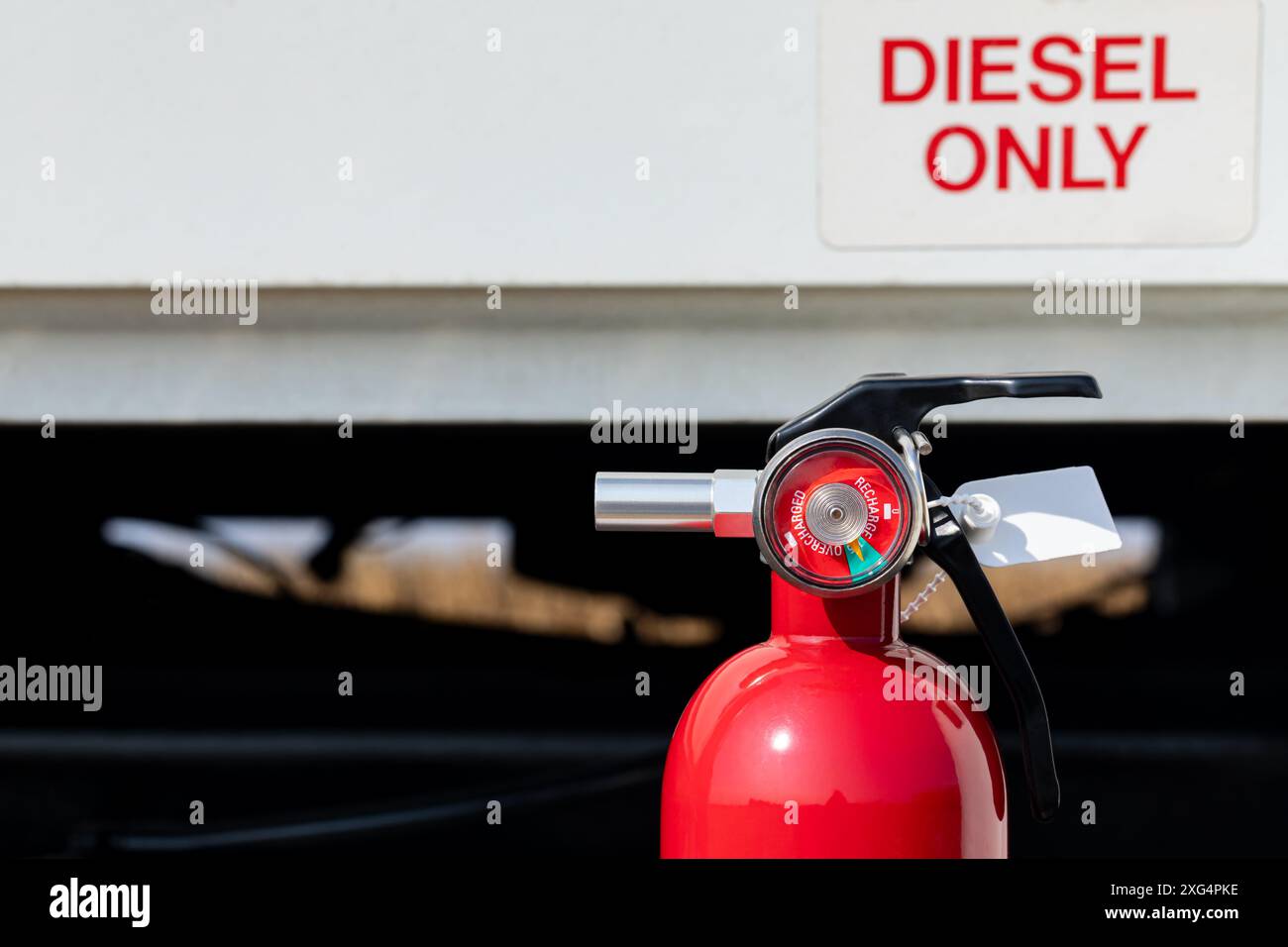 Fire extinguisher and diesel fuel tank on grain truck during harvest ...
