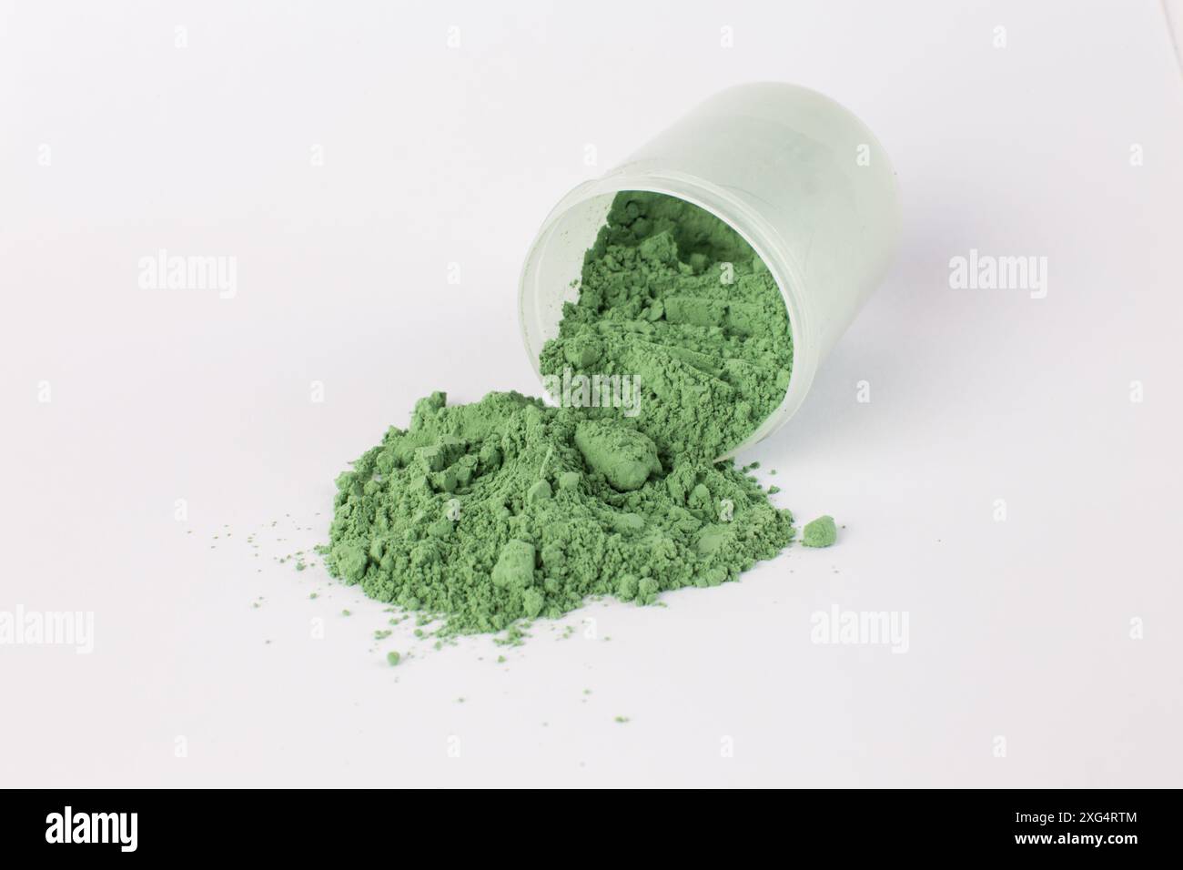 Chromium oxide pigment on a white background Stock Photo - Alamy
