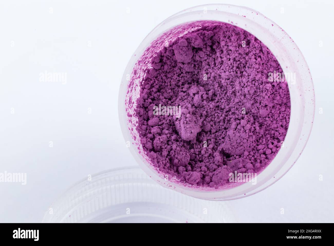 purple pigment on a white background Stock Photo - Alamy