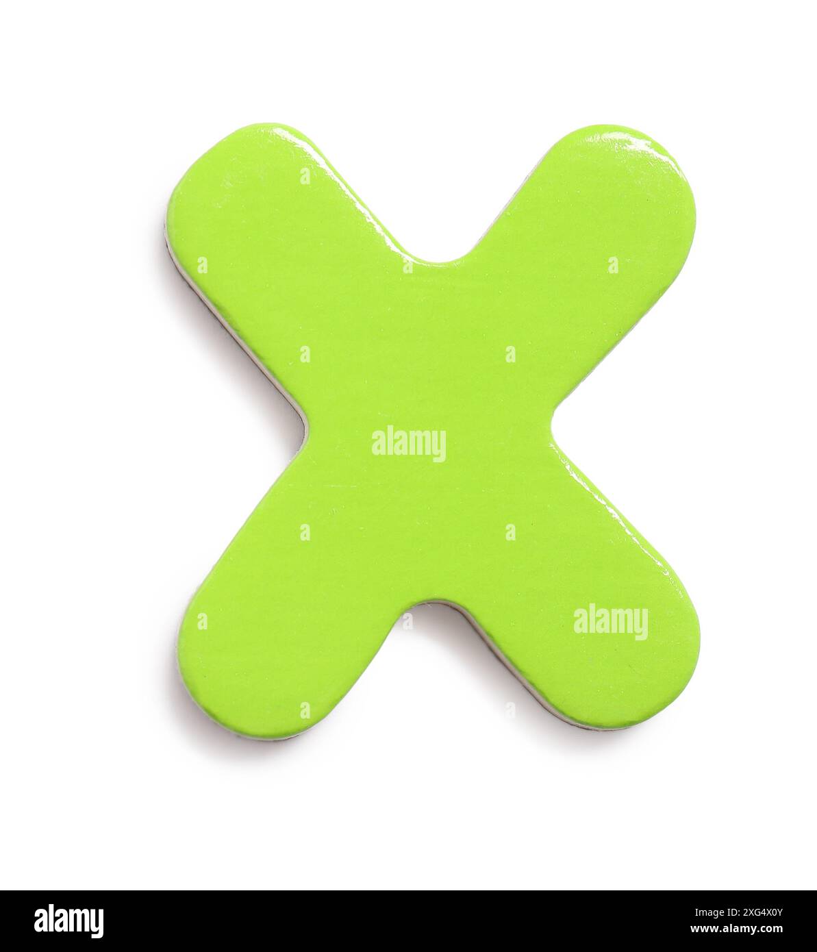 Alphabet. Green magnetic letter X isolated on white, top view Stock ...