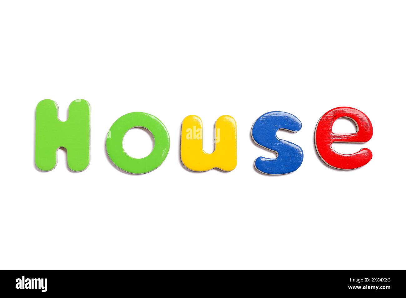 Alphabet. Word House of magnetic letters isolated on white, top view ...