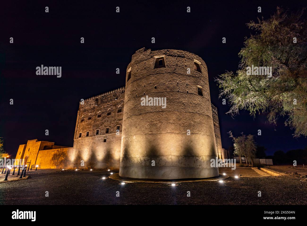 Jabreen citadel fortress stone walls and round bastion tower, Bahla ...