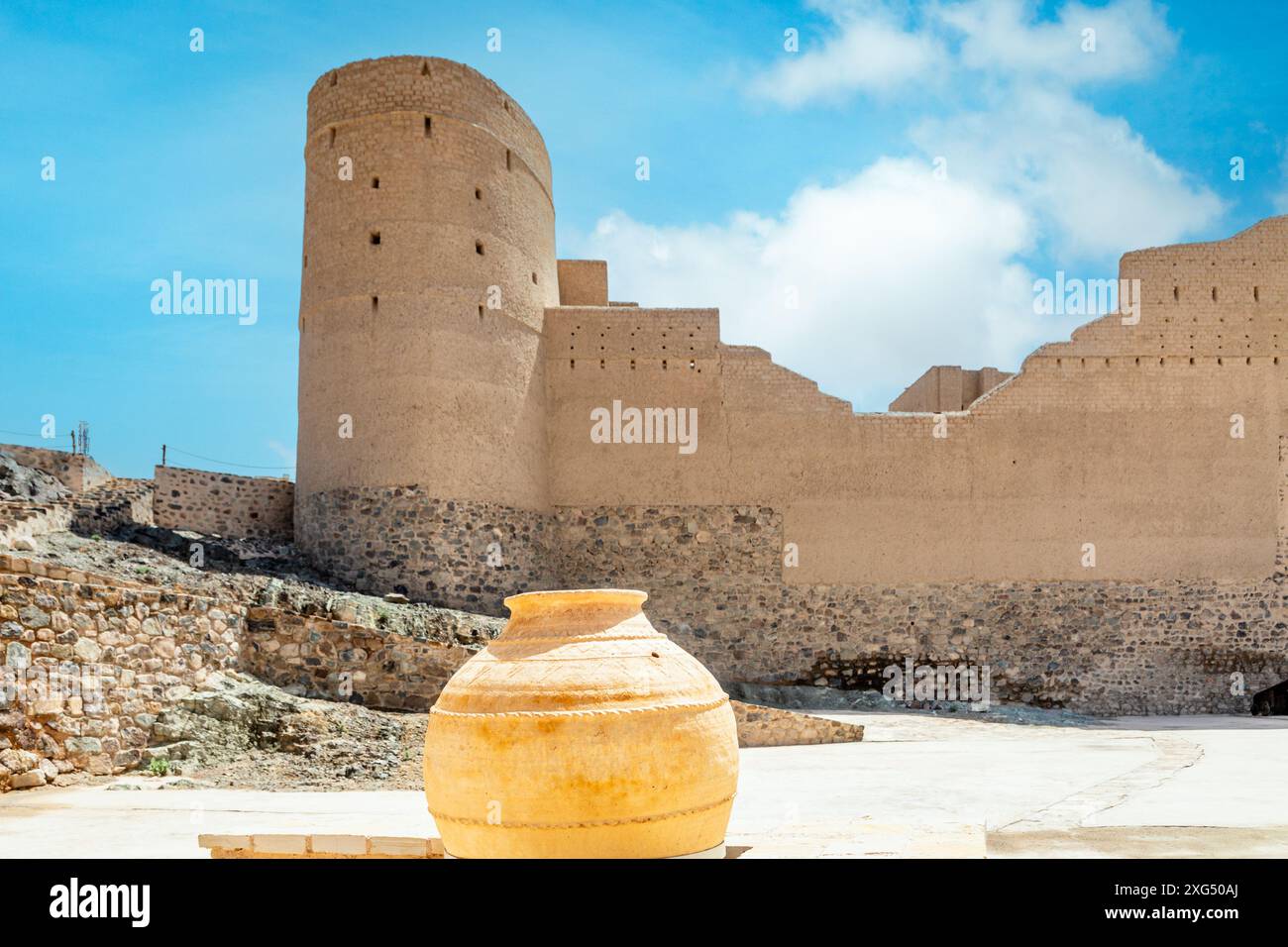 Bahla citadel fortress walls and bastion with amphora in the foreground ...