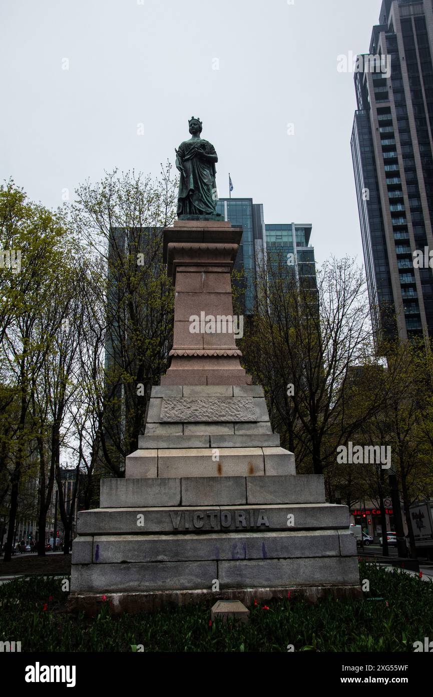 Statue of Queen Victoria at Victoria Square in downtown Montreal ...