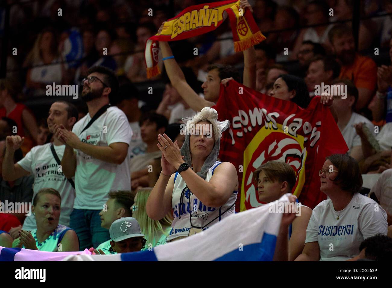 Spain and Finland fans together seen in action during the game between ...