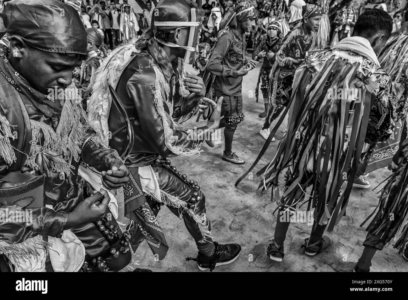 A group of Devils performs a lively dance at Plaza del Coco during the ...