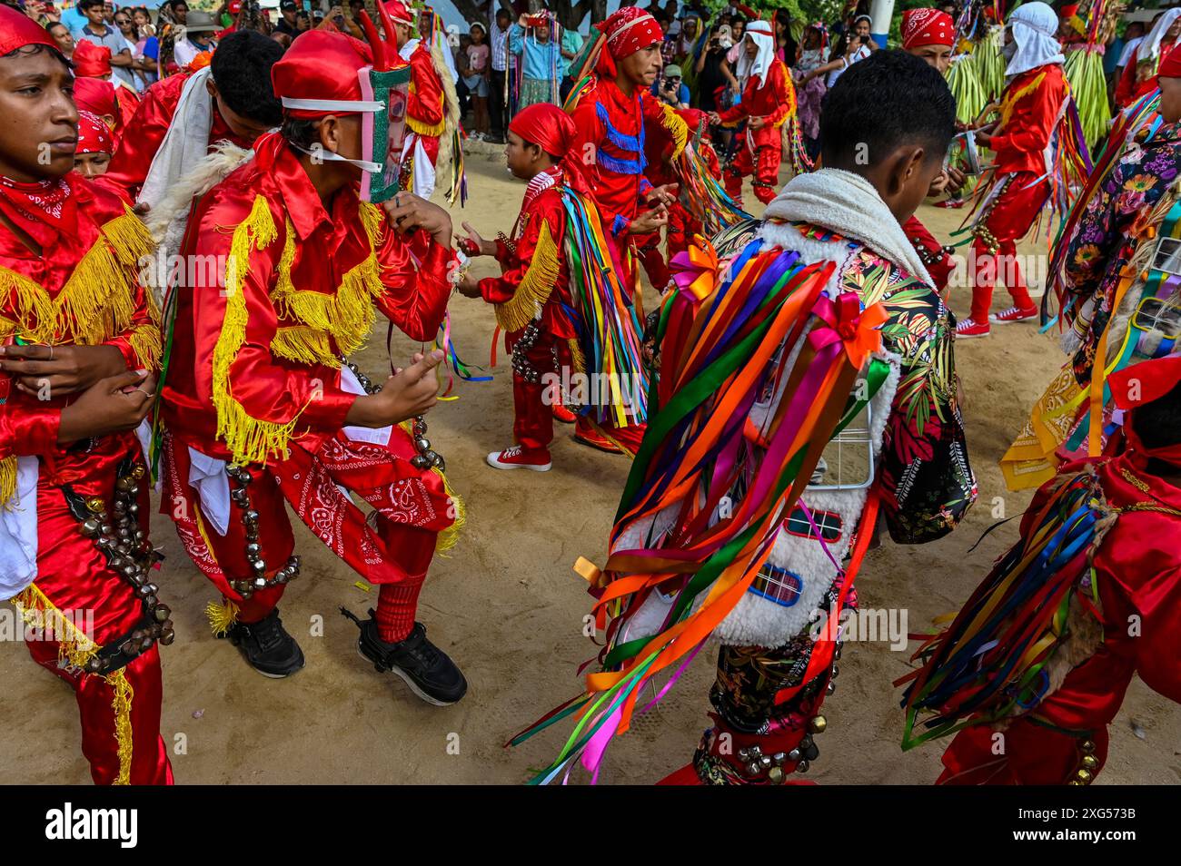 A group of Devils performs a lively dance at Plaza del Coco during the ...