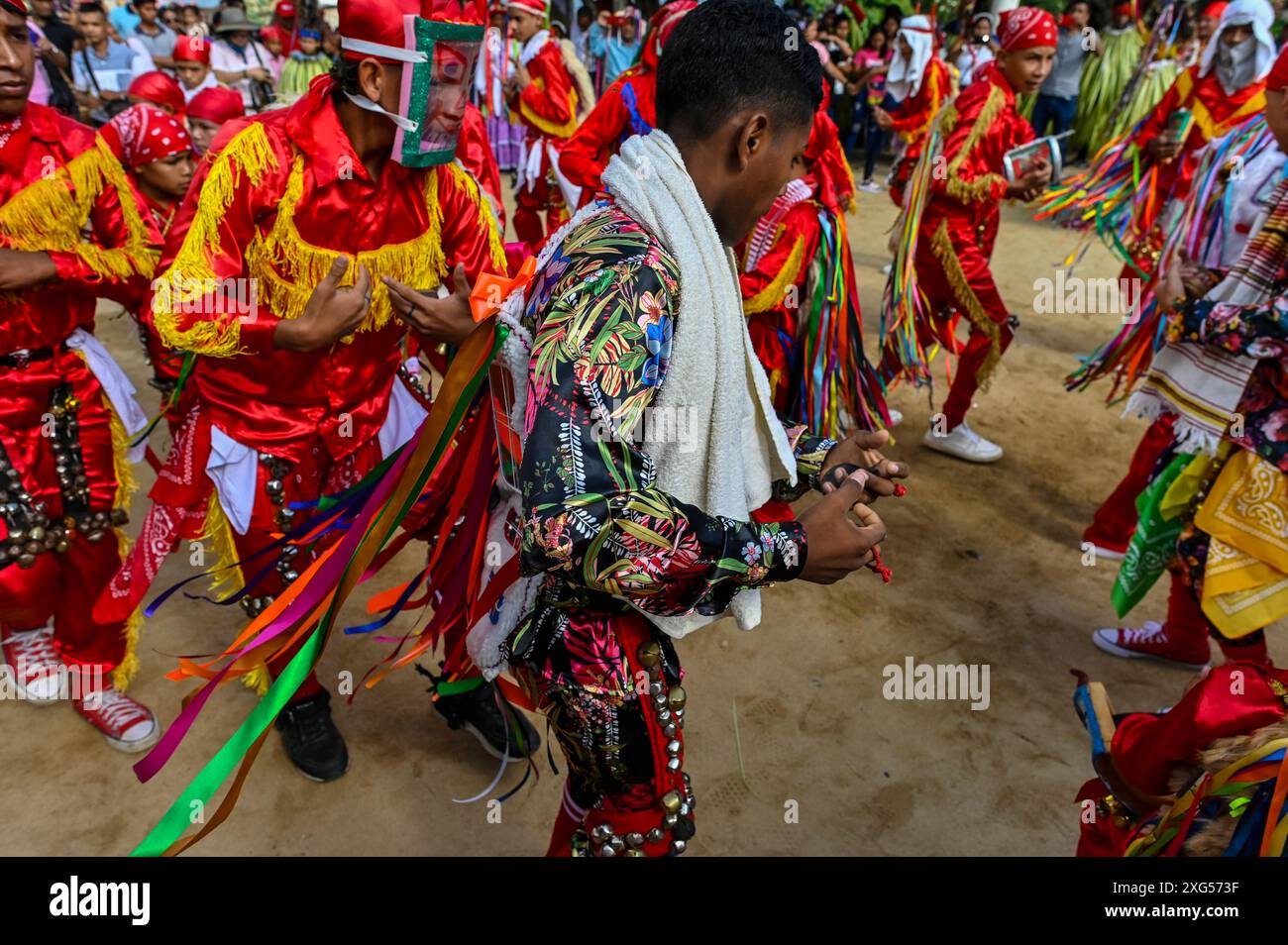 A group of Devils performs a lively dance at Plaza del Coco during the ...