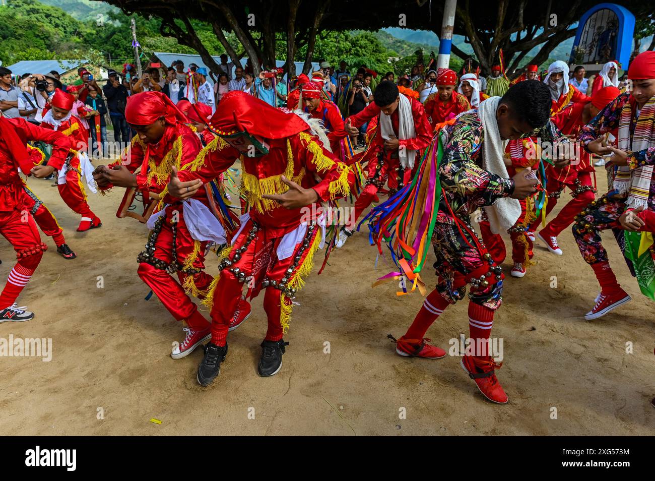 A group of Devils performs a lively dance at Plaza del Coco during the ...
