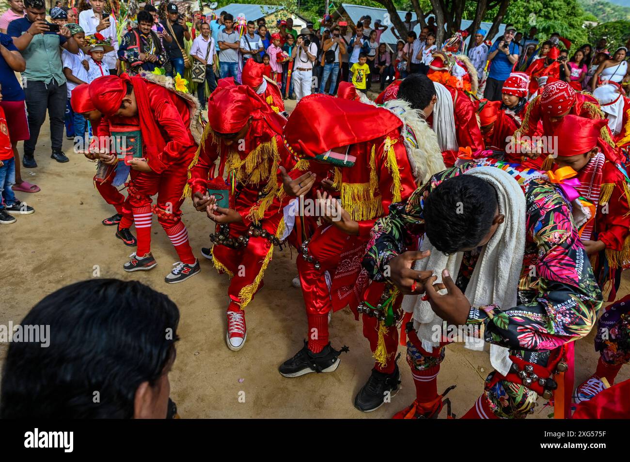 A group of Devils performs a lively dance at Plaza del Coco during the ...