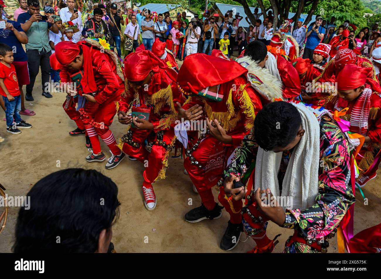 A group of Devils performs a lively dance at Plaza del Coco during the ...