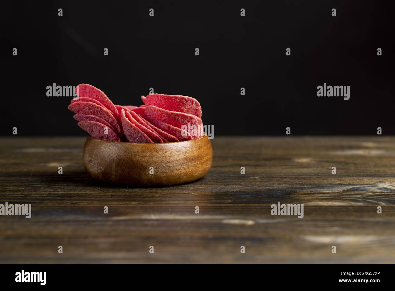 red potato chips with meat flavor, adding red dye to potato chips Stock ...