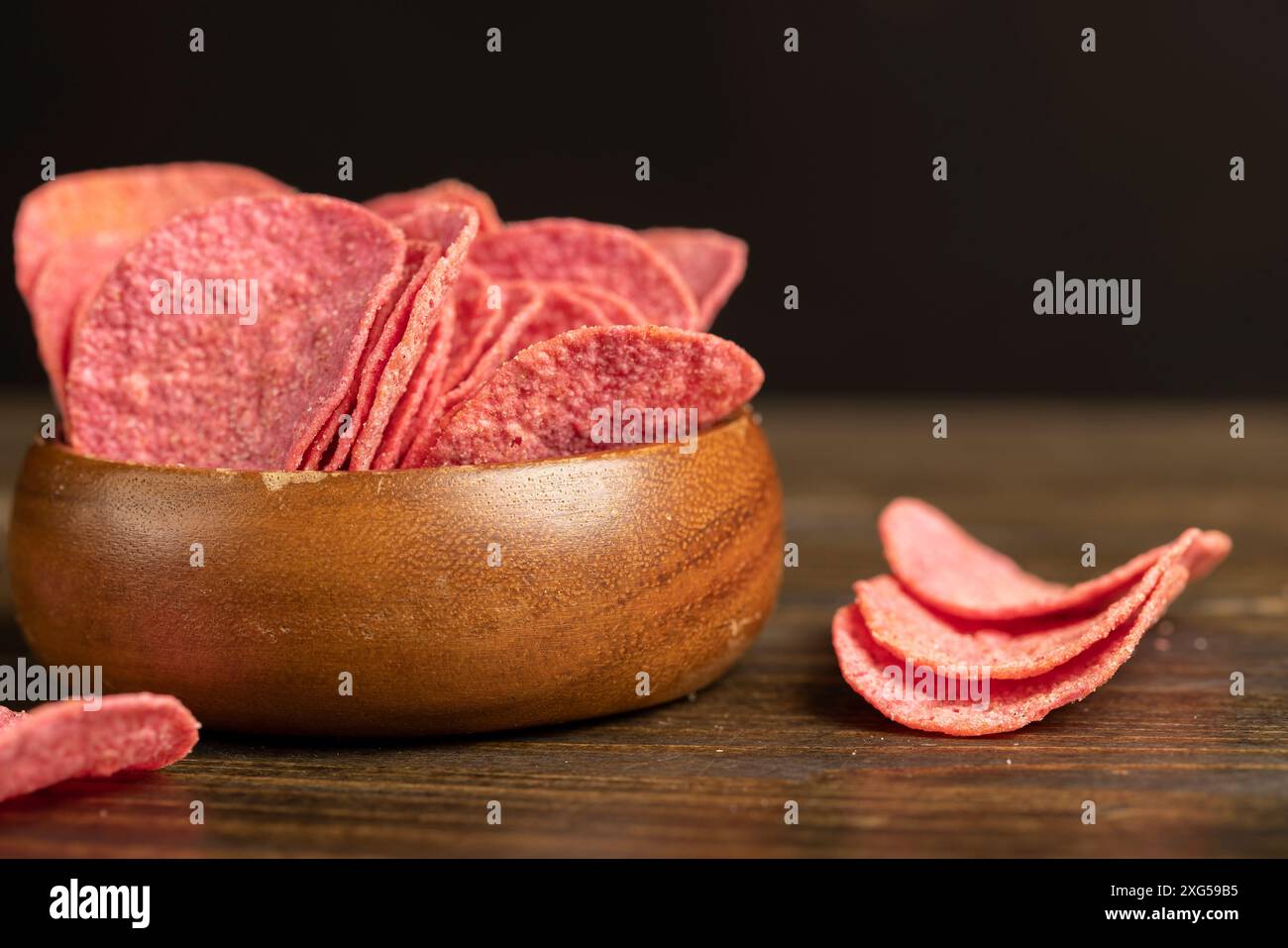 red potato chips with meat flavor, adding red dye to potato chips Stock ...