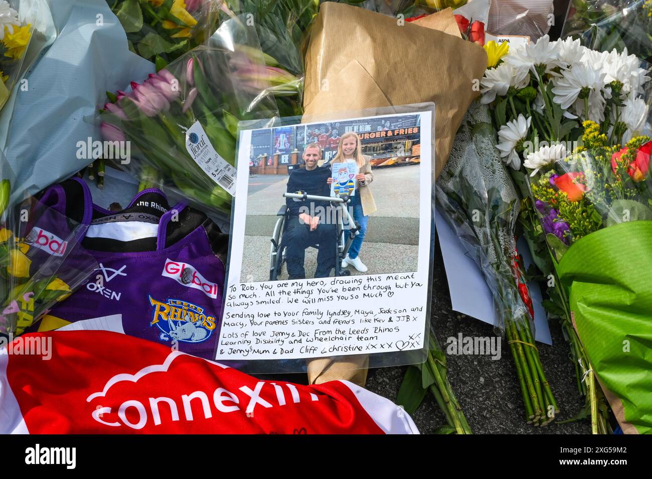 Fans pay their respects and leave tributes to former Leeds Rhinos ...