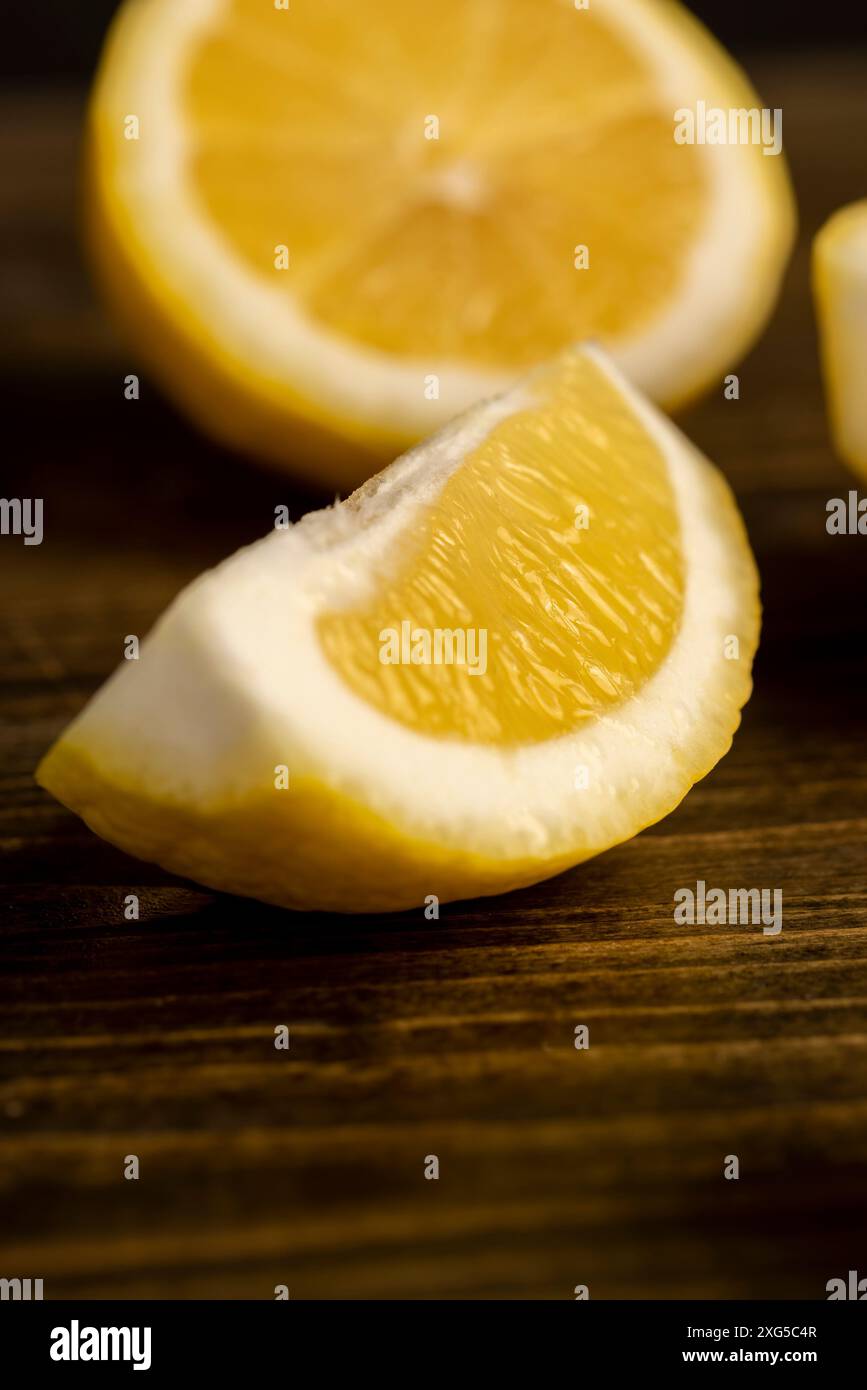 ripe sliced lemon on a board, ripe sliced lemon close up Stock Photo ...