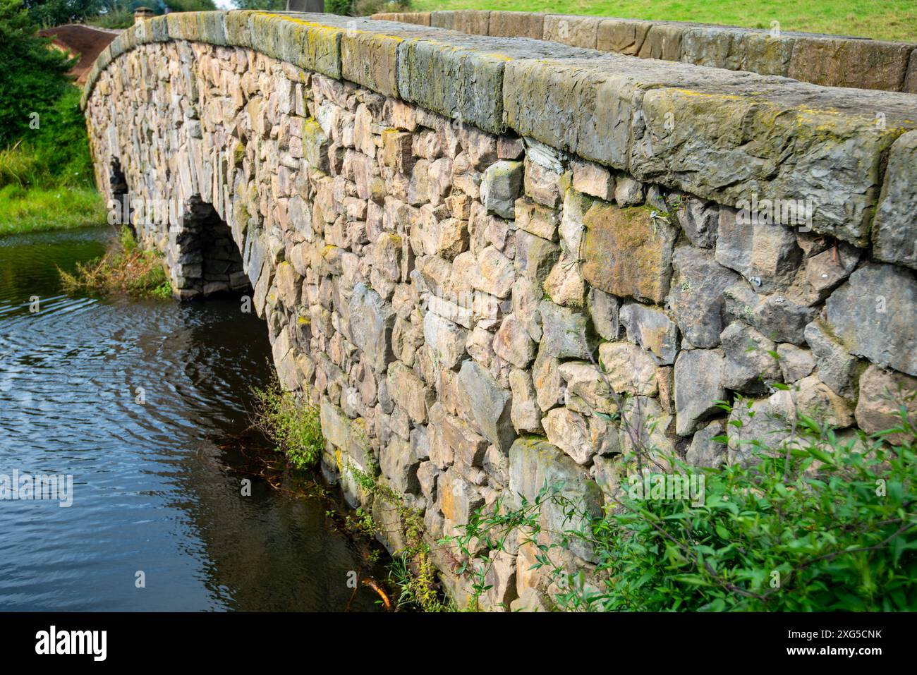 Stone Bridge on Pond - New Zealand Stock Photo - Alamy