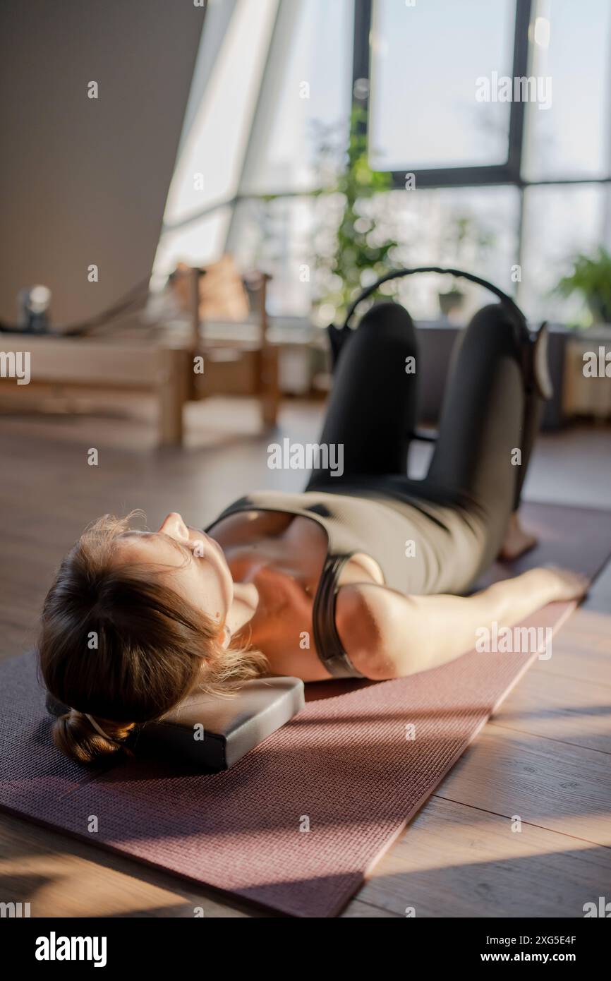 Glute bridge in pilates workout hi-res stock photography and images - Alamy