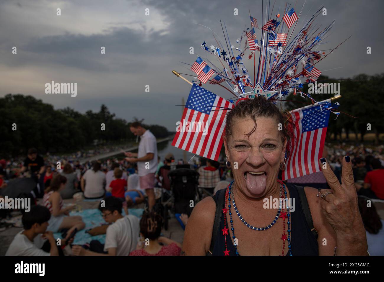 People wait for fireworks to celebrate US Independence Day on July 4 ...