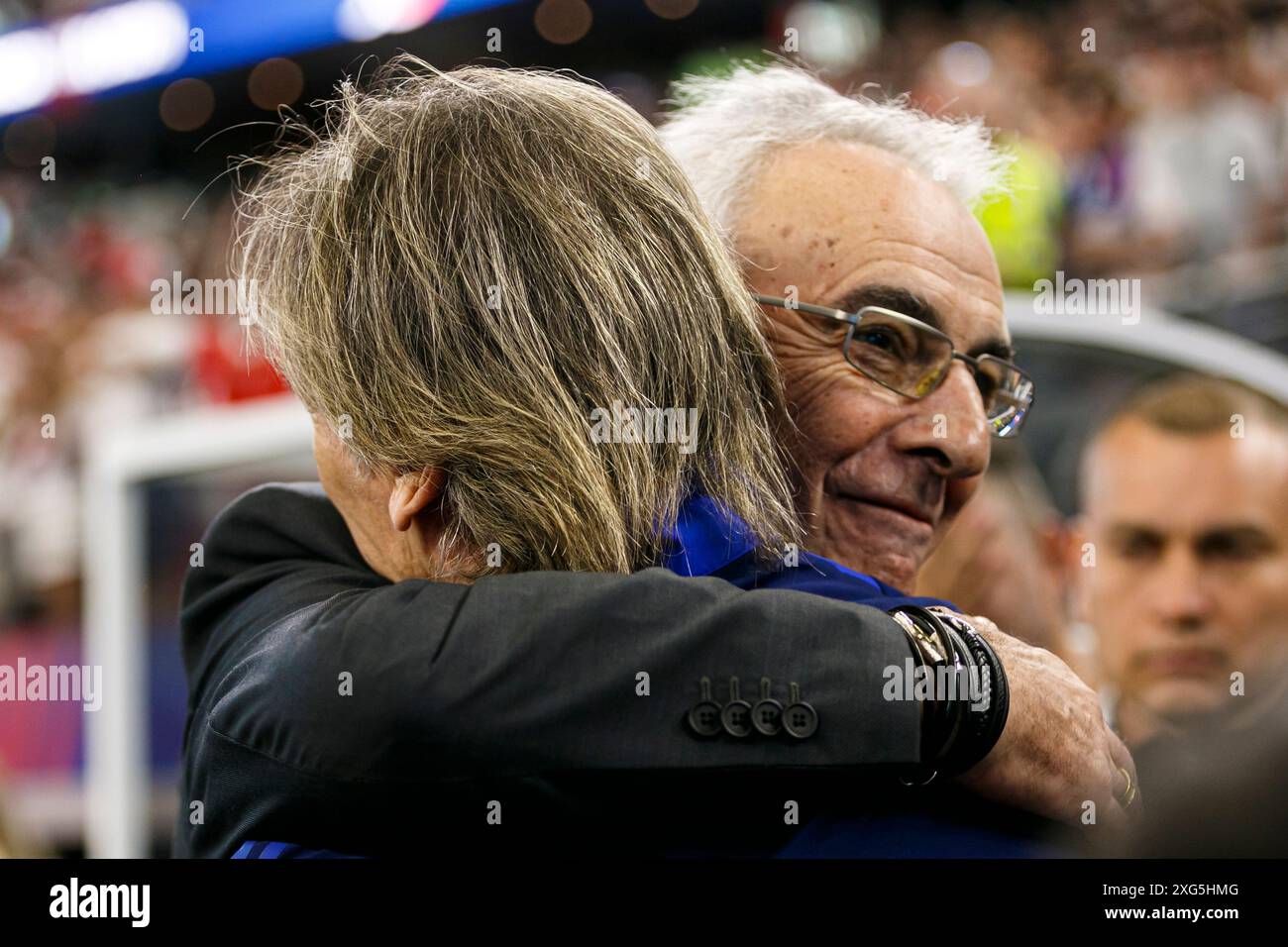ARLINGTON, TEXAS - JUNE 21: Chile Head Coach Ricardo Gareca hugs Peru ...