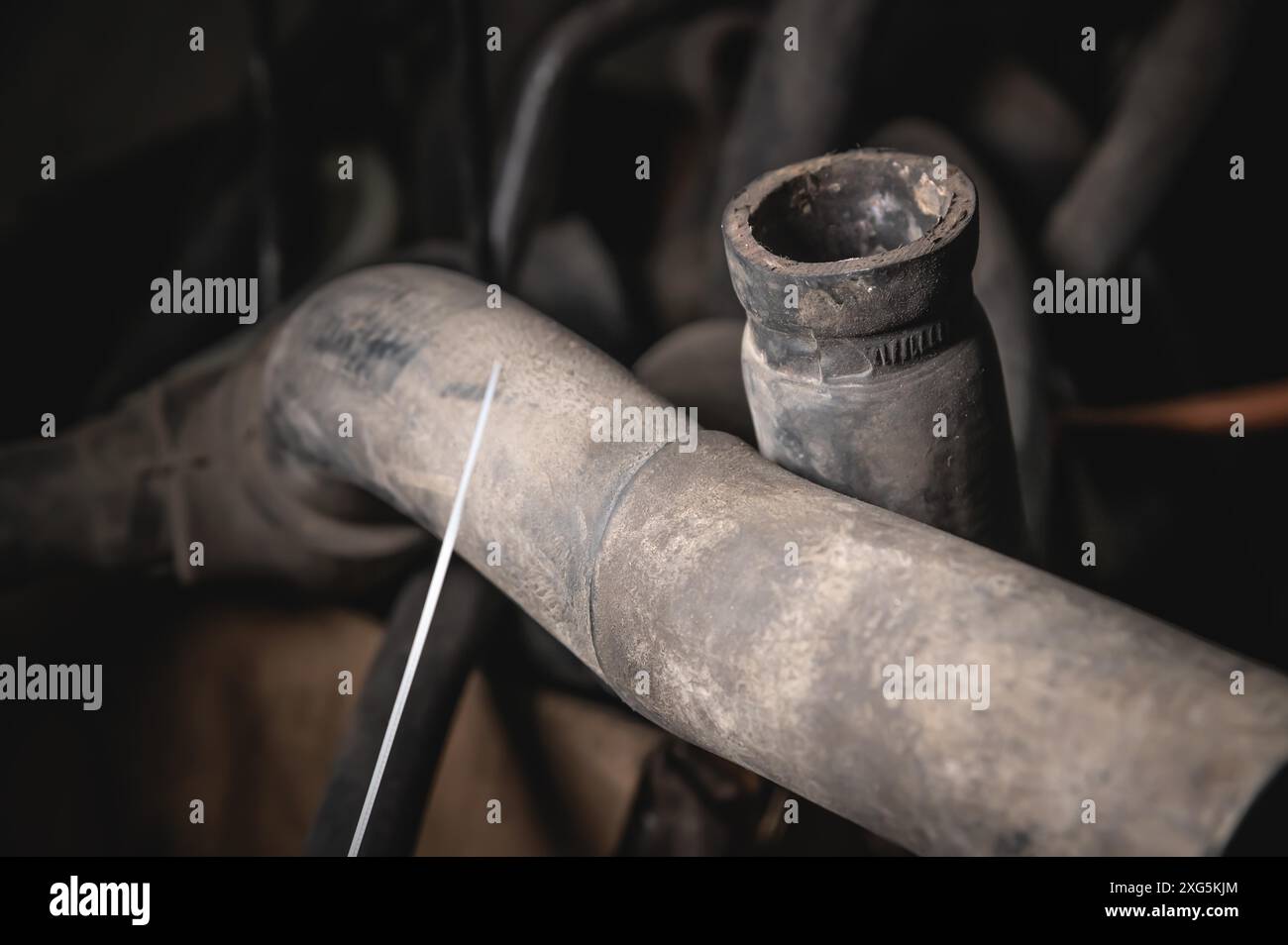 Rubber pipes and hoses leading from the car radiator to the engine ...