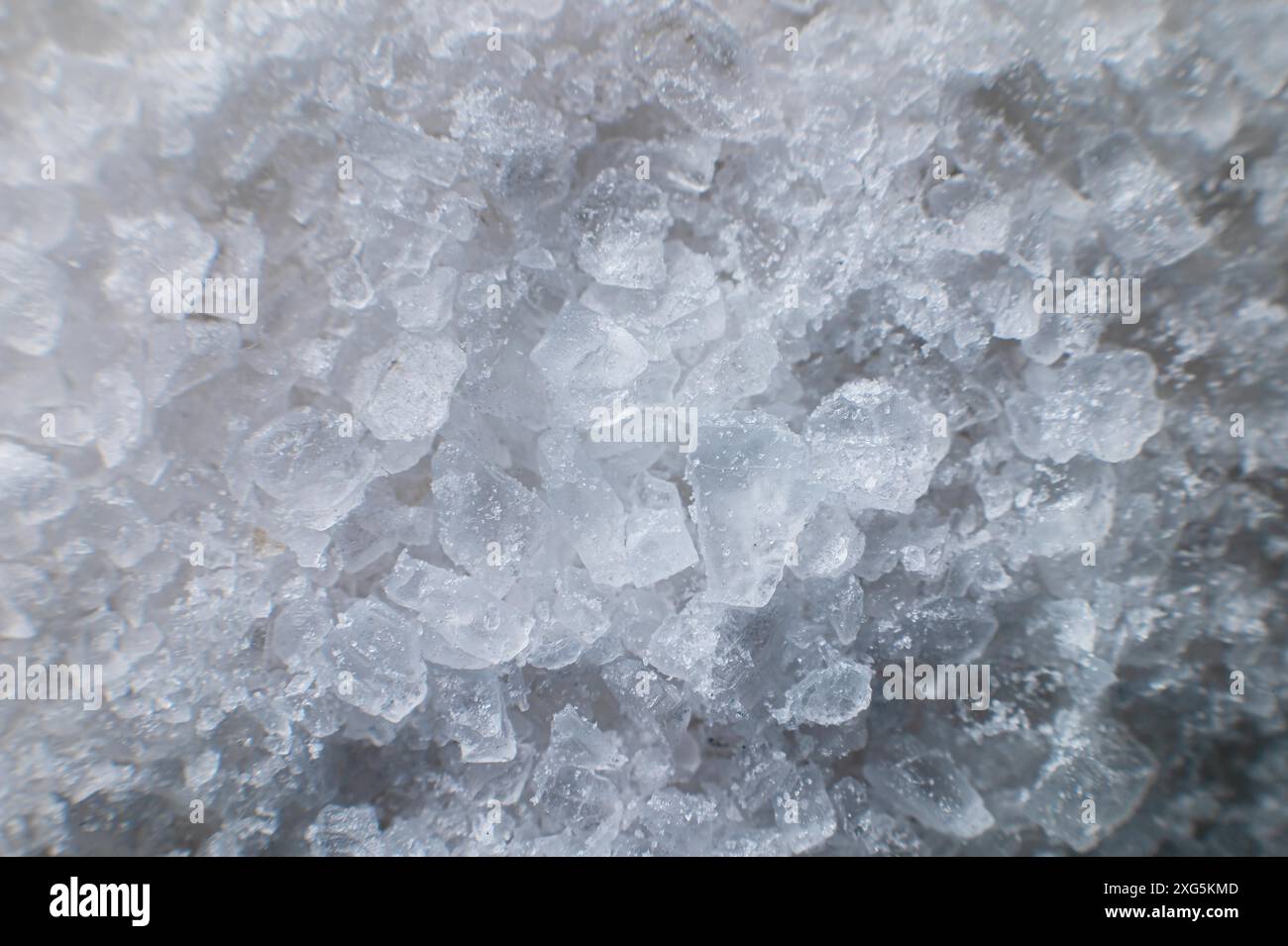 Coarse white iodized salt. Detailed background texture Macro close-up ...