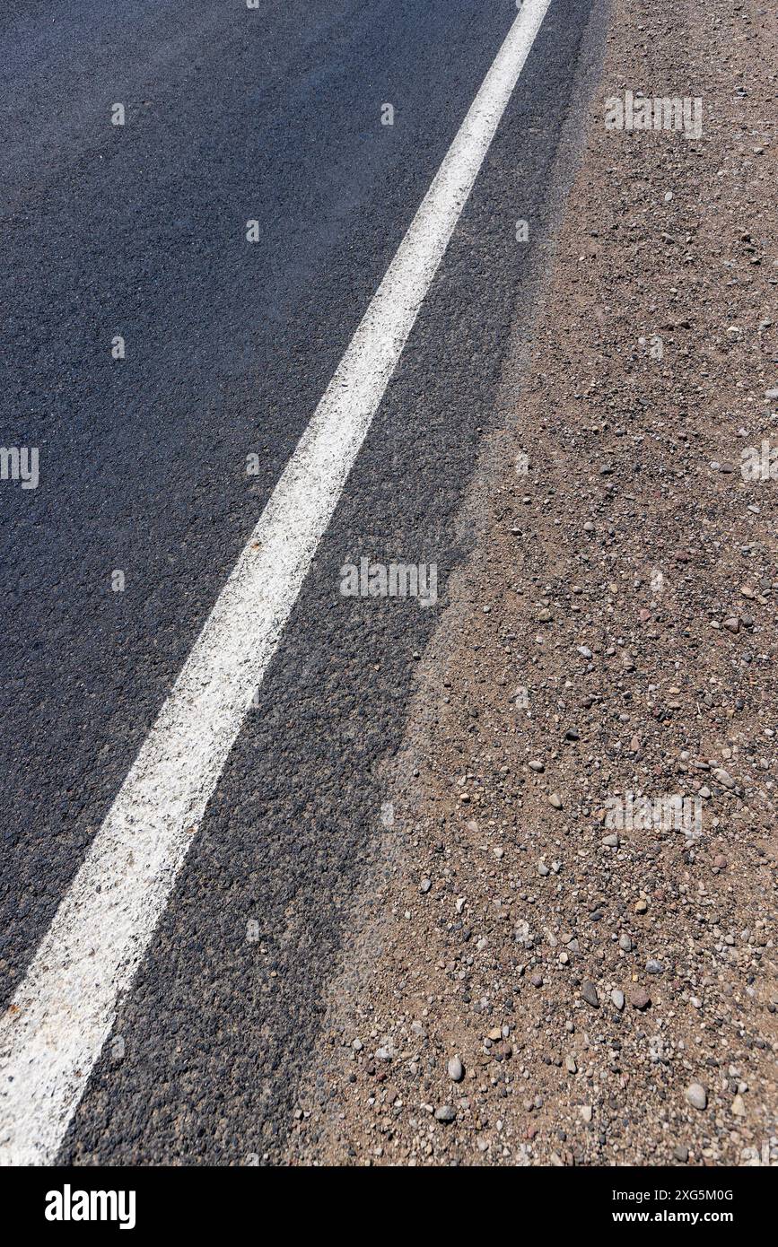 white road markings on asphalt, details of road markings on the road ...