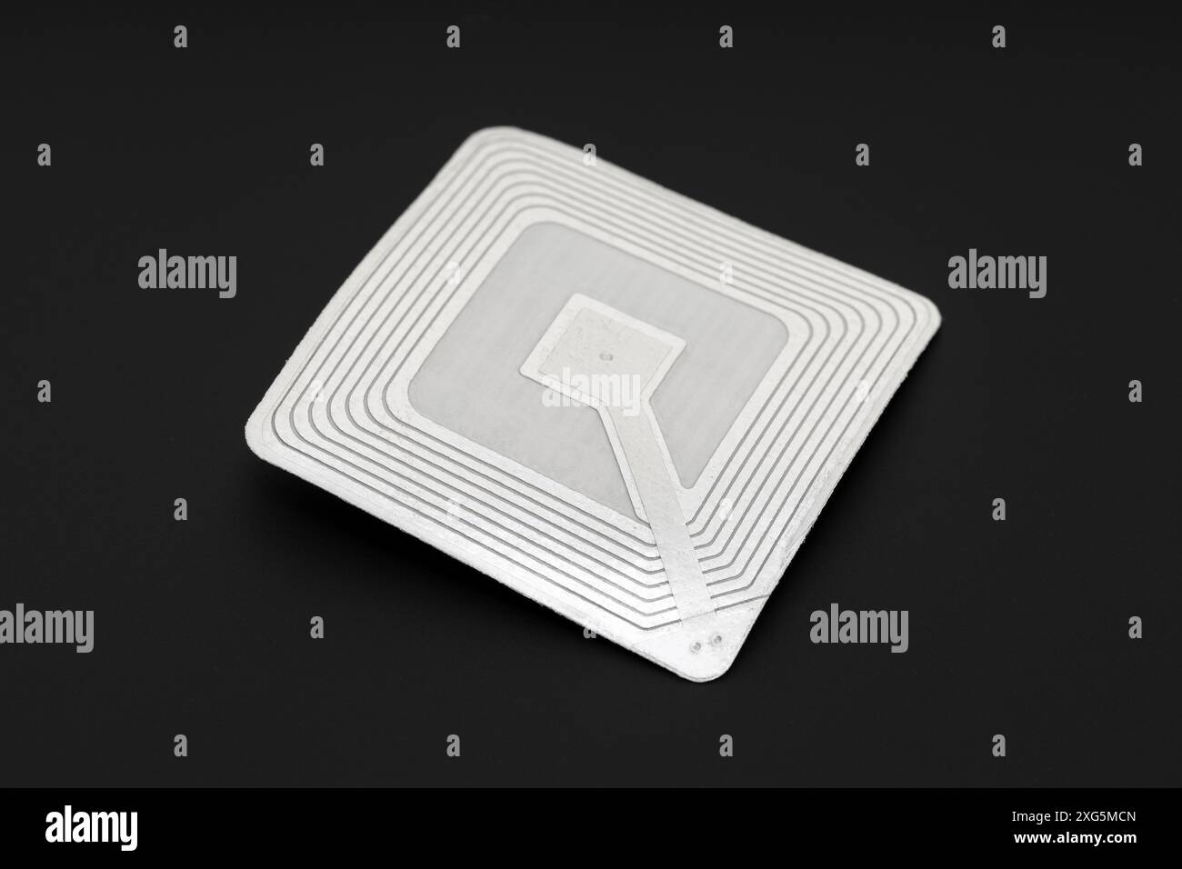 RFID tag isolated on black background. Radio frequency identification ...