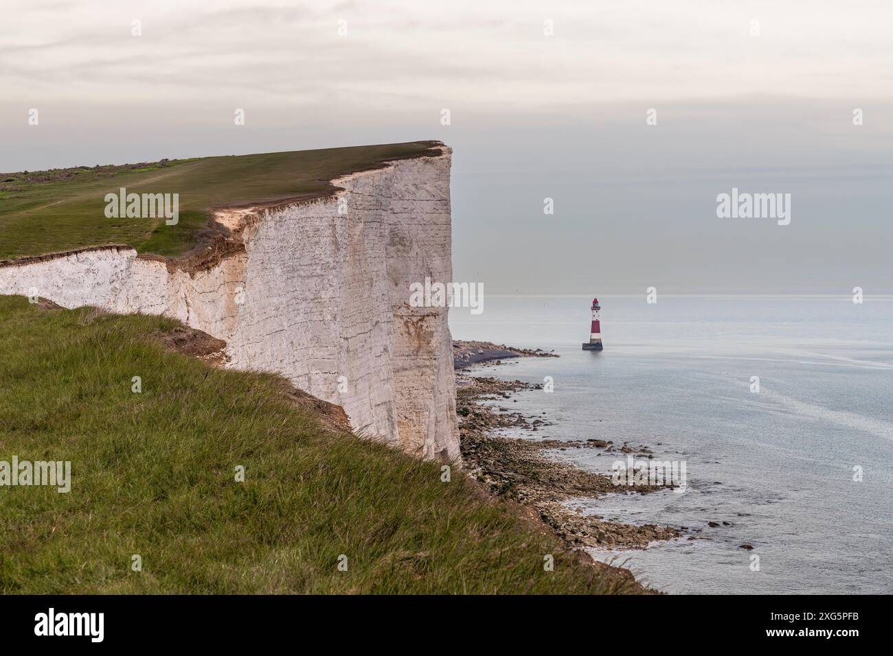 The lighthouse and cliffs at Beachy Head near Eastbourne, East Sussex ...