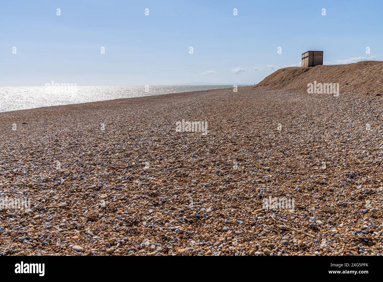 The pebble beach and the bird hide in Dungeness, Kent, England, UK ...