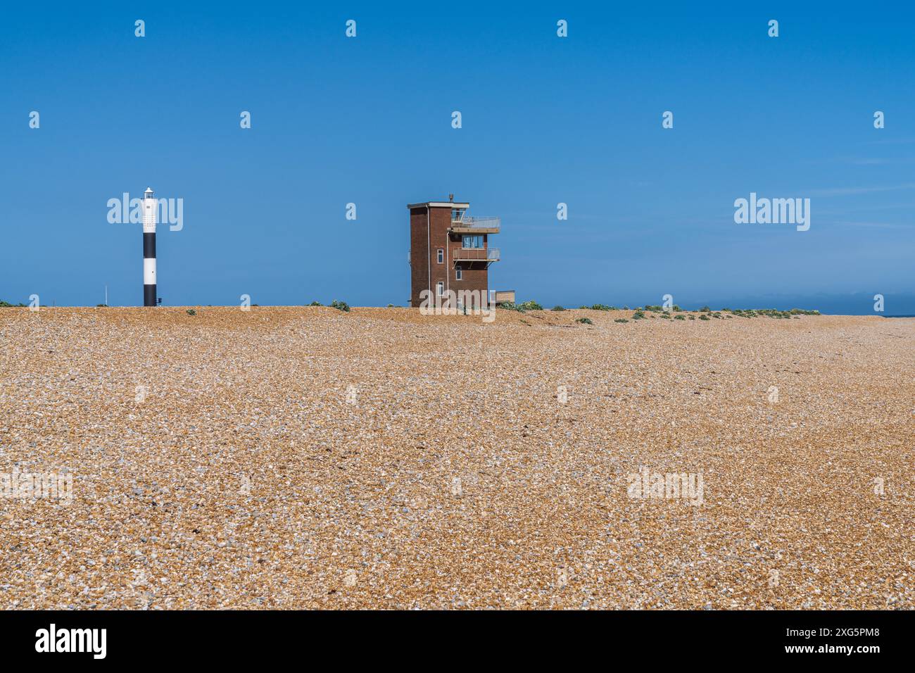 The beach with the Old Lifeguard Station and the New Lighthouse in ...
