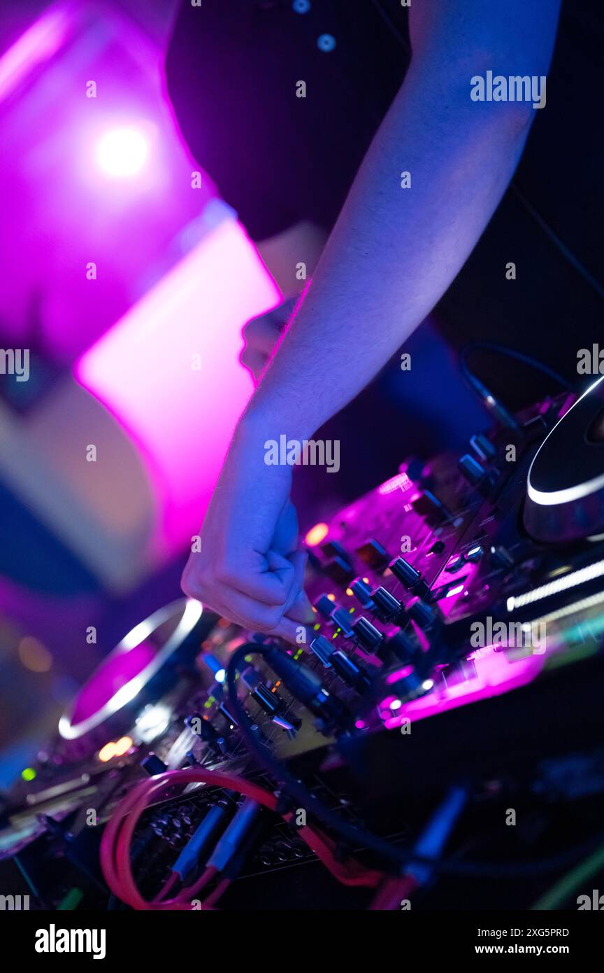 Dj mixing at party festival with light and smoke in background, Summer ...