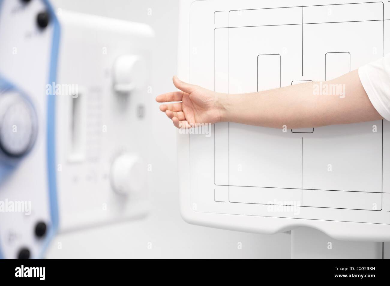 Man in x-ray room having medical scan examination in a modern hospital ...