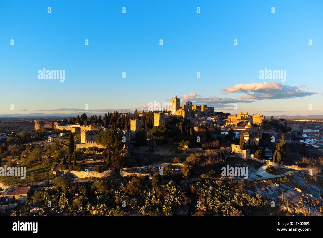 Aerial view of a scenic sunset at medieval village of Trujillo in ...