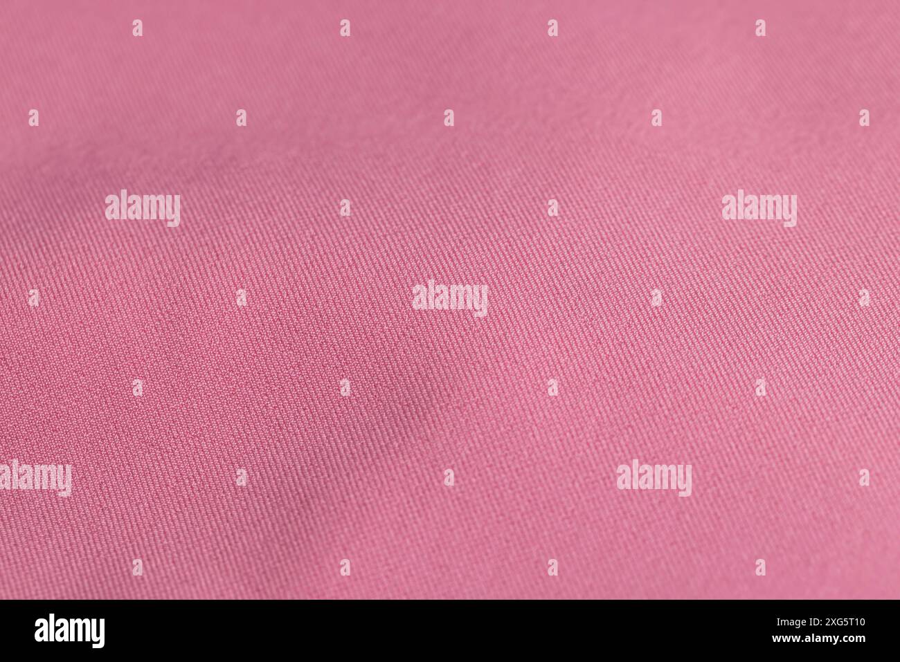 pink cotton material close-up, a piece of clothing made of pink fabric ...