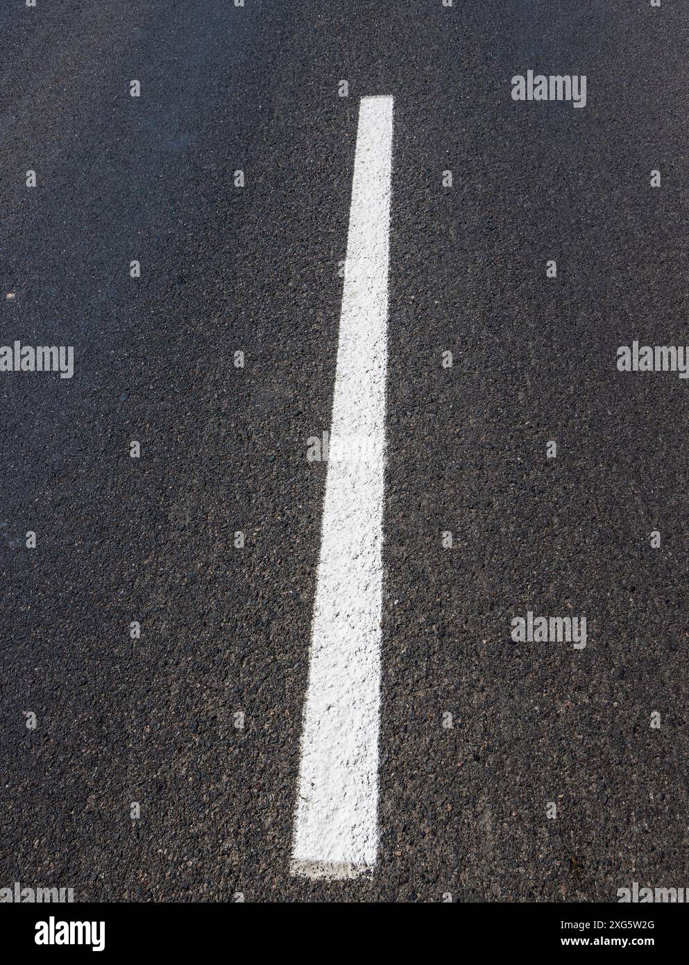 white road markings on asphalt, details of road markings on the road ...
