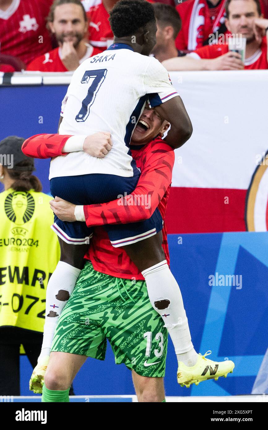 Dusseldorf. 6th July, 2024. Bukayo Saka (front) of England celebrates ...