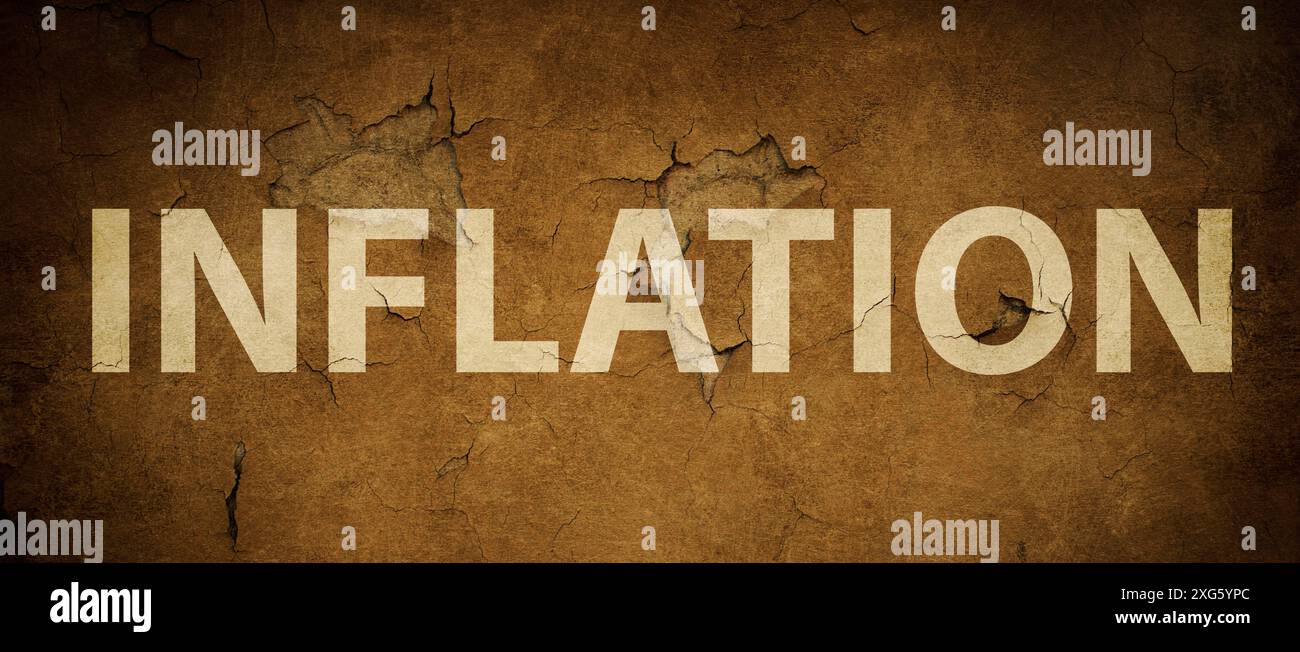 The word inflation is standing on a brown textured wall, increasing ...