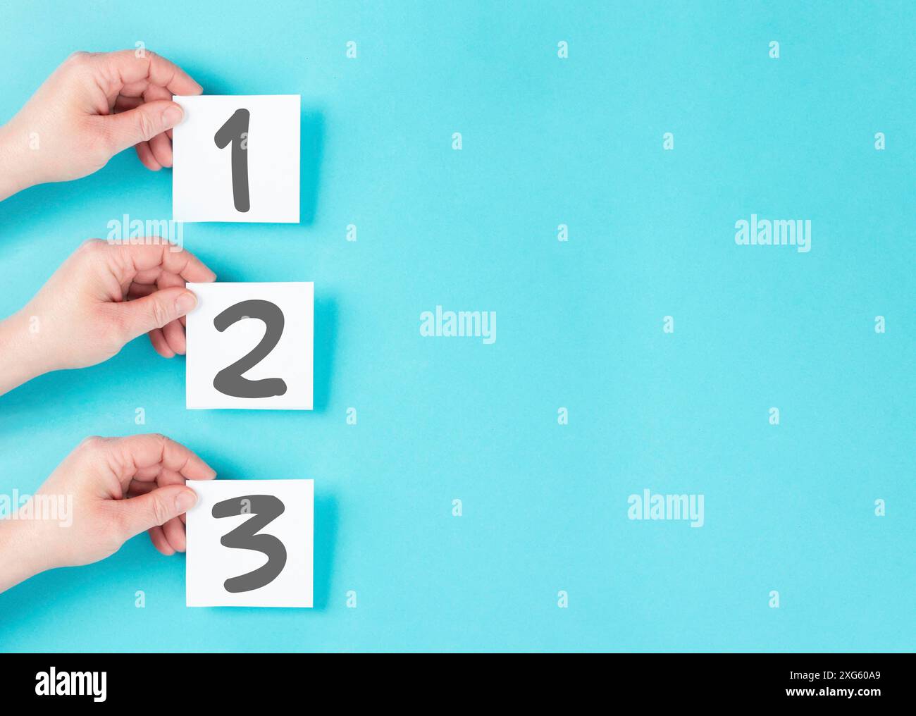 The numbers one, two and three are standing on paper, lesson and ...