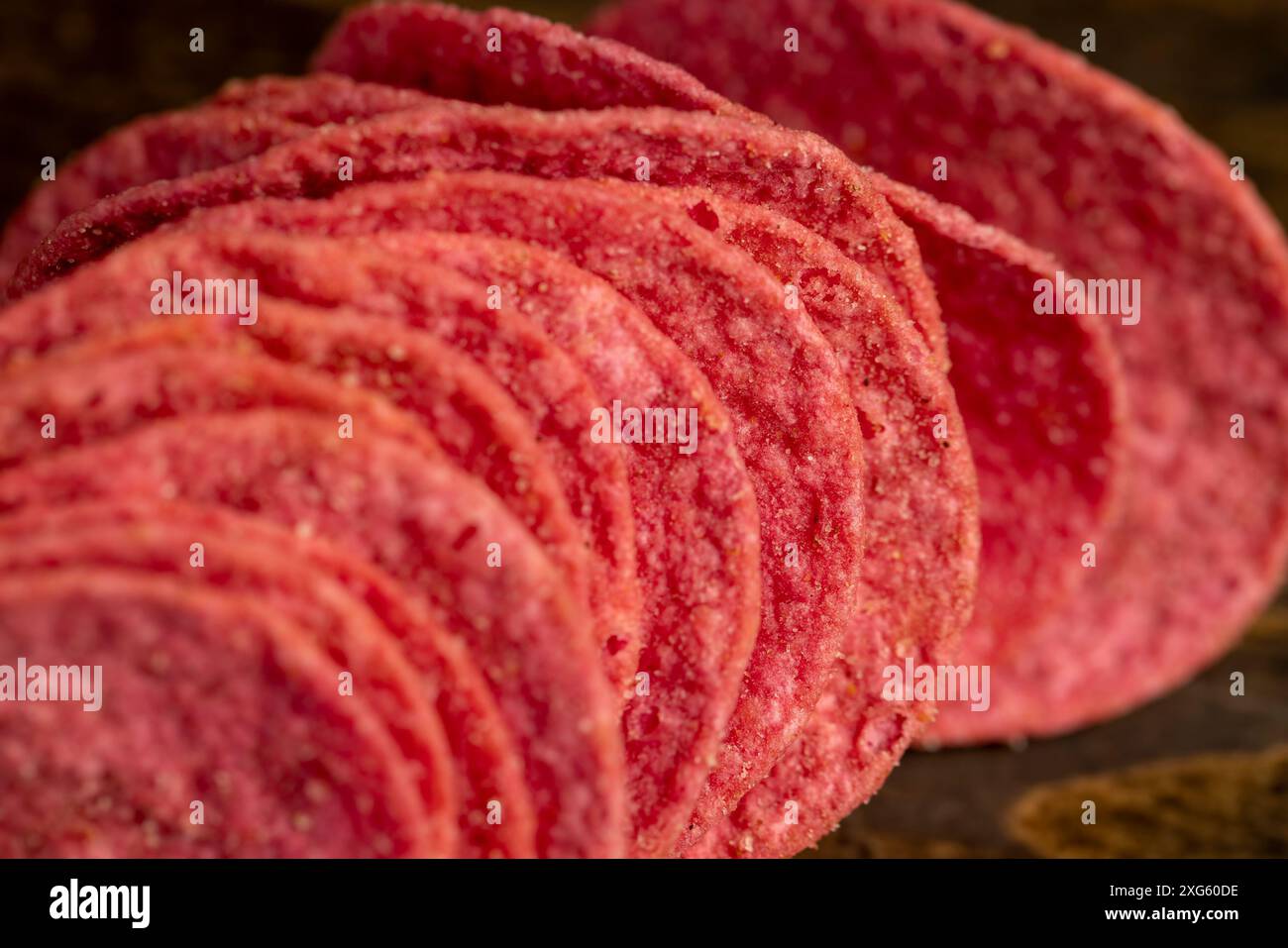 red potato chips with meat flavor, adding red dye to potato chips Stock ...