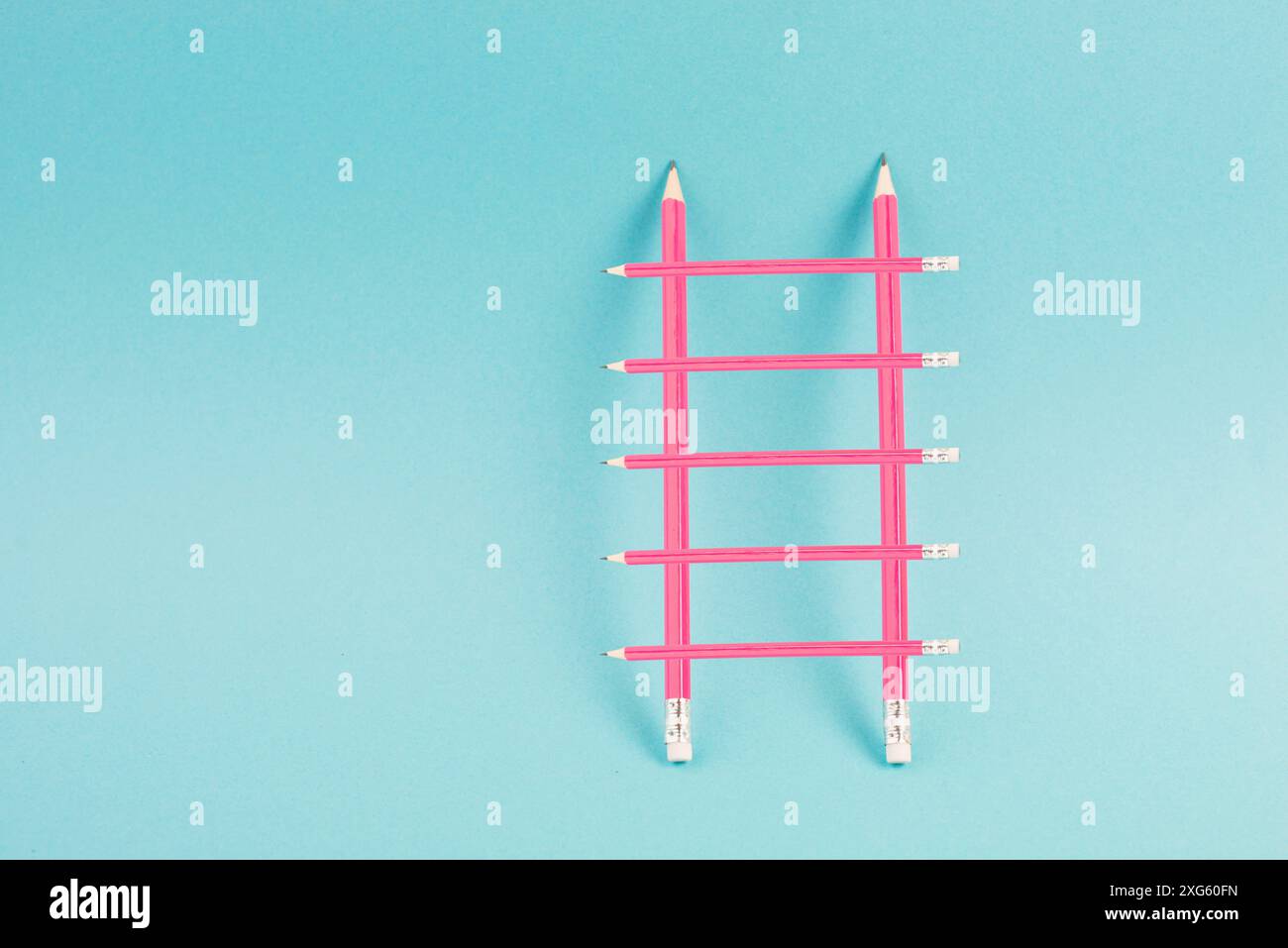 Ladder of success build with pencils, opportunity strategy, blue ...