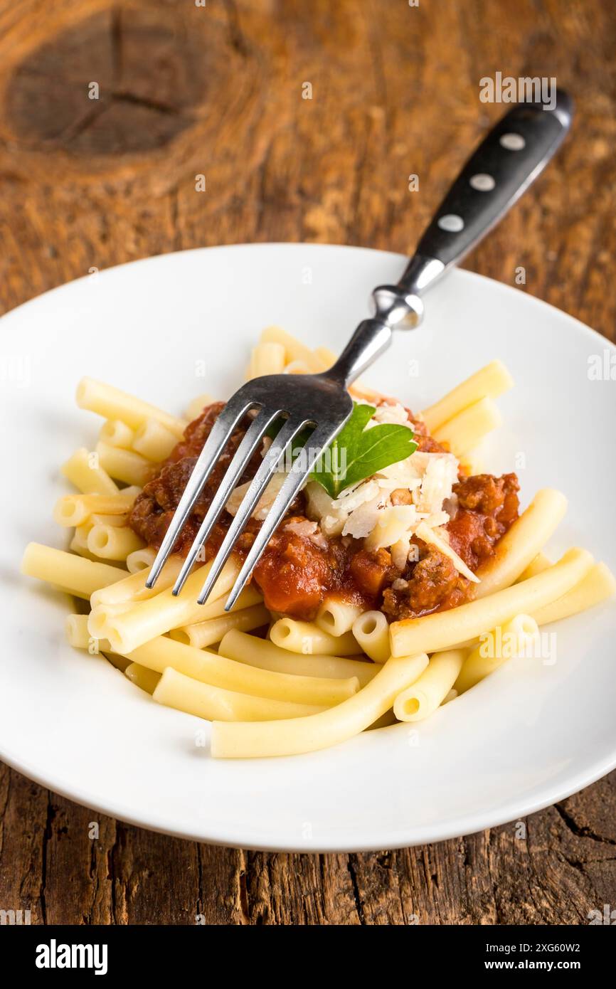 Maccheroni pasta with sauce bolognaise Stock Photo - Alamy