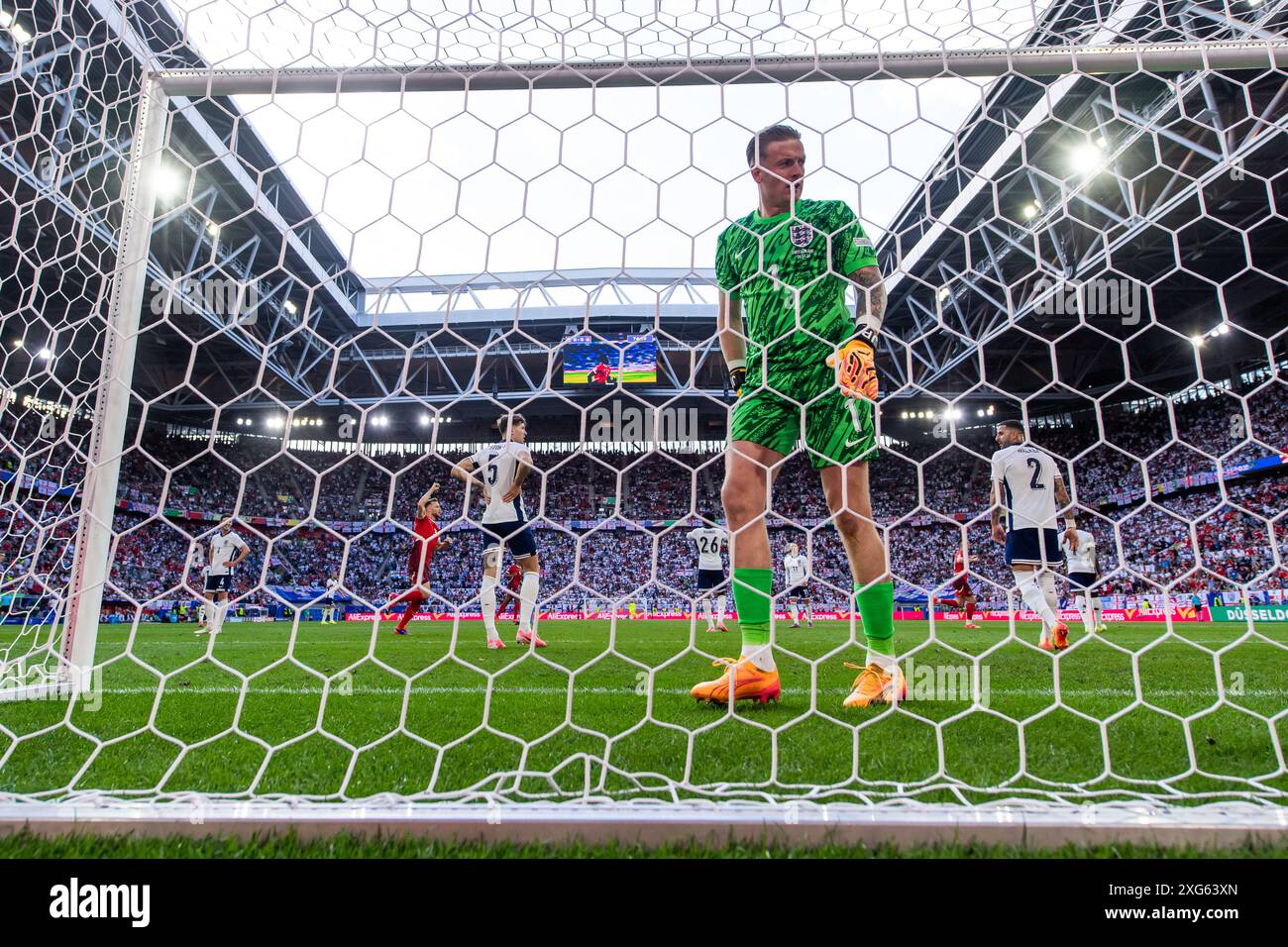 Goalkeeper, Jordan. , . Pickford of England looks dejected after Breel ...