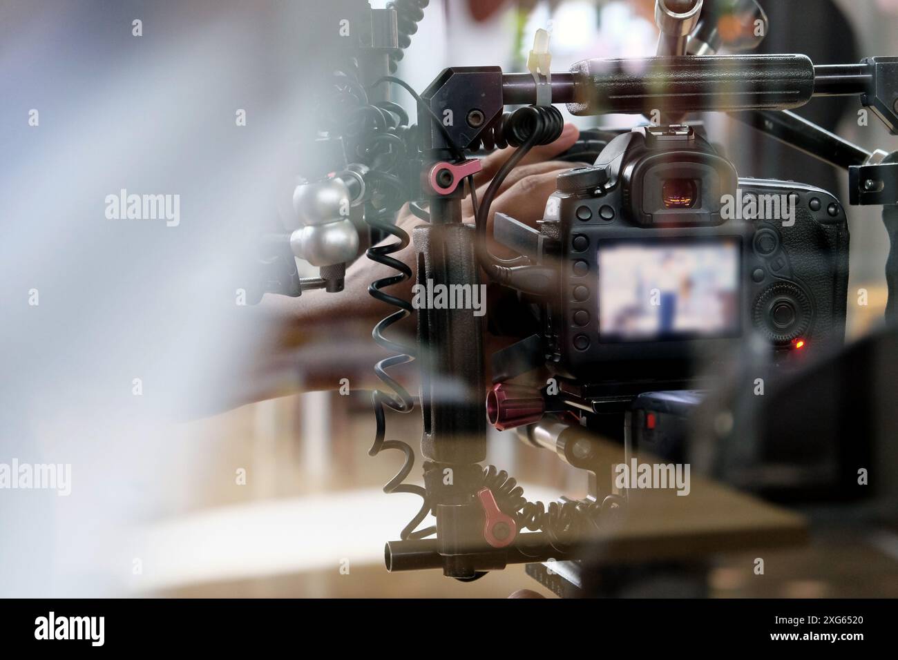 Behind the scenes of a movie. Film crew working in a studio Stock Photo ...