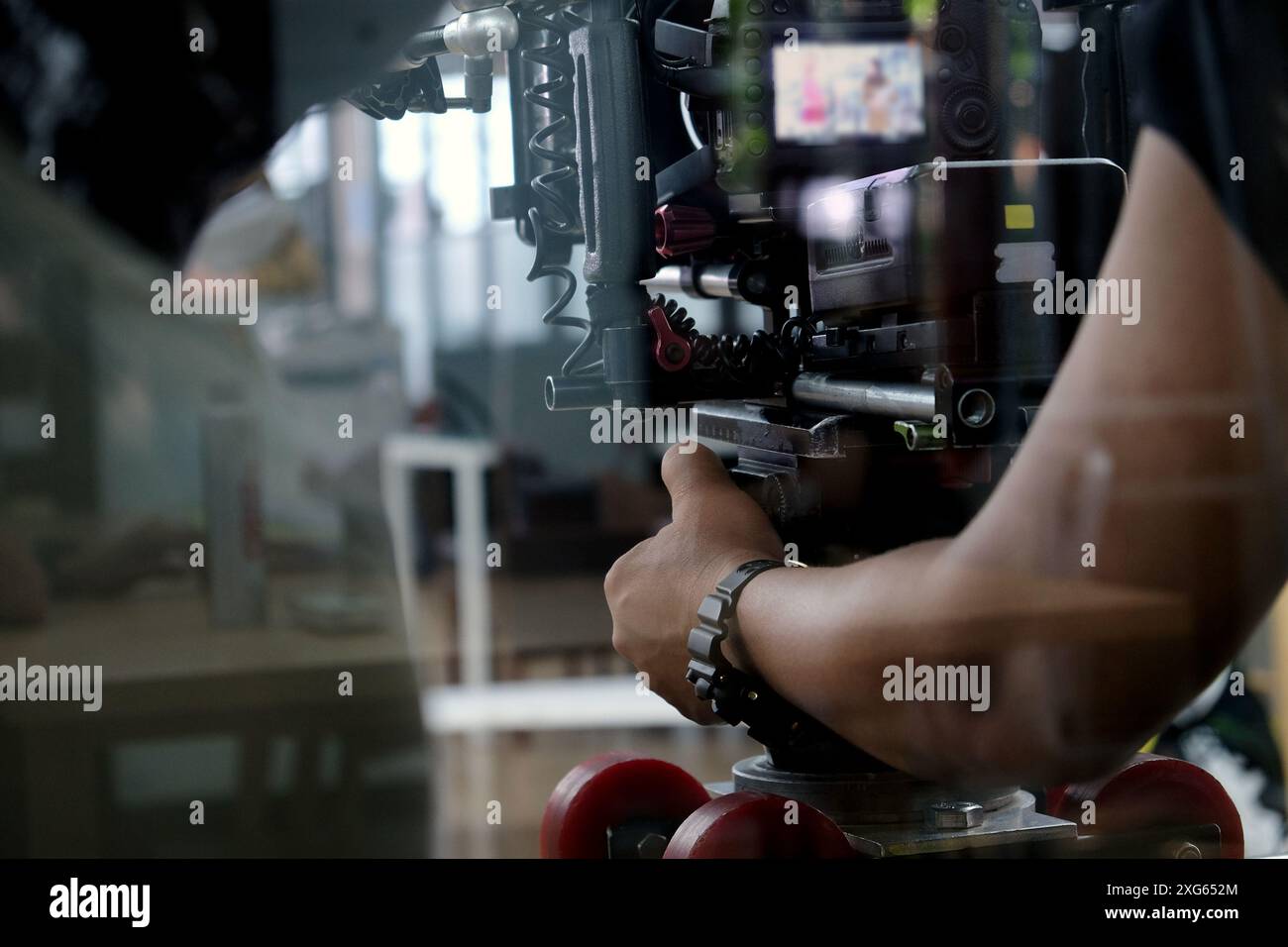 Behind the scenes of a movie. Film crew working in a studio Stock Photo ...